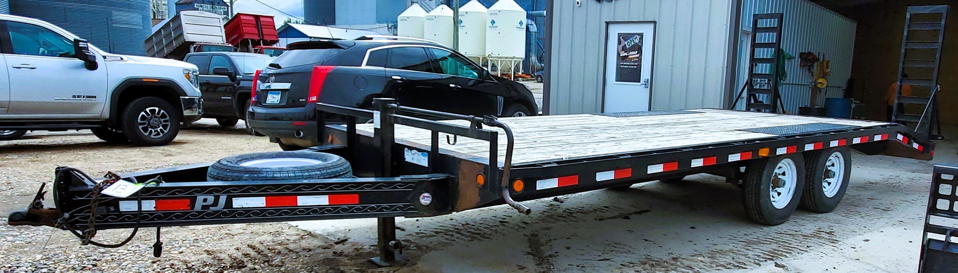 Skid Steer, Trailers, Attachments, Golf Carts & Hoop Buildings